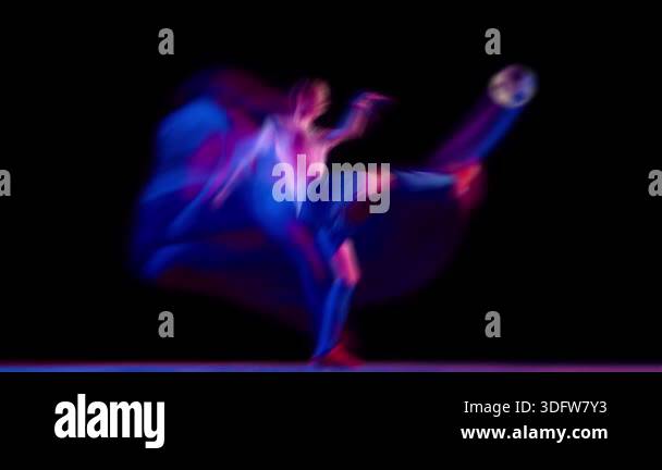 Promo video. Motion blurred soccer kick action on dark background ...
