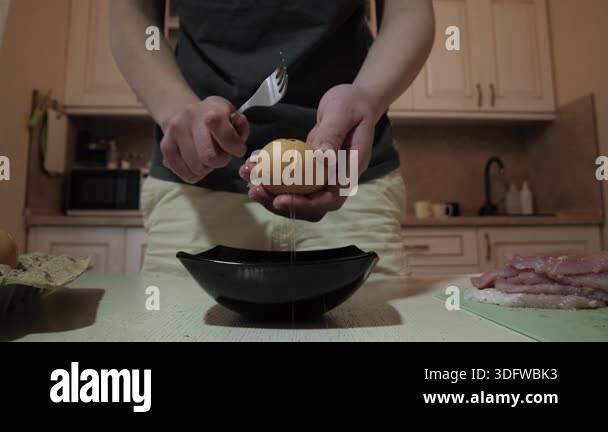 Egg break scene cracking activity, Casual home chef cracks egg into ...