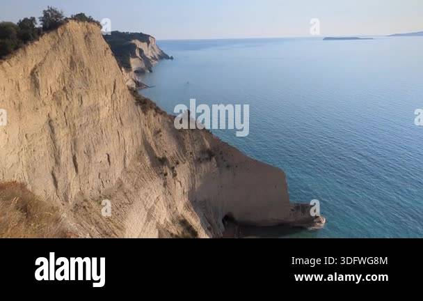 The peculiar forms of limestone rocks forming a coastal cliff above the ...