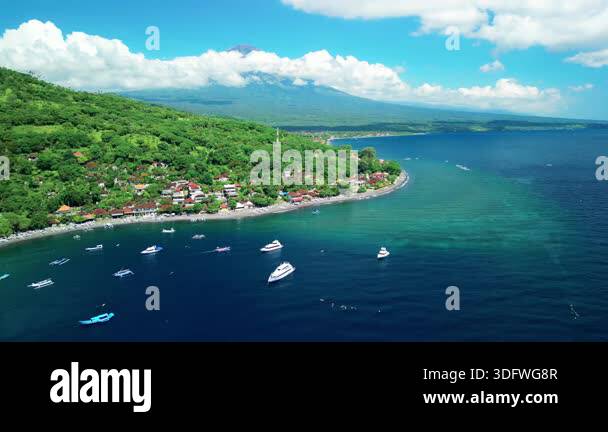 High-quality aerial of Jemeluk Bay in Amed with vibrant blue waters ...