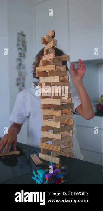 Finished block tower remains upright expressing patience balance and ...