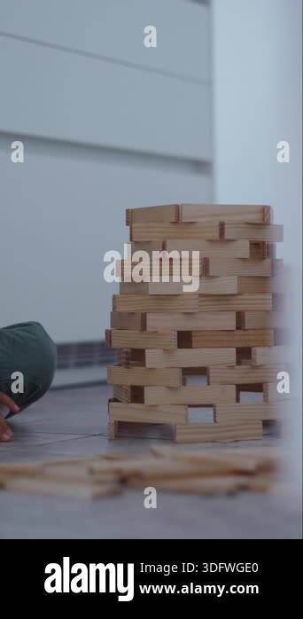 Wooden blocks stacked into stable tower showing alignment balance and ...