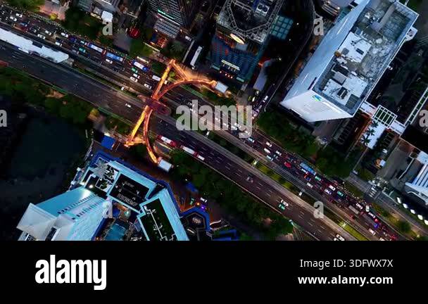 Aerial drone view of Jakarta cityscape above Jalan Jenderal Sudirman at ...