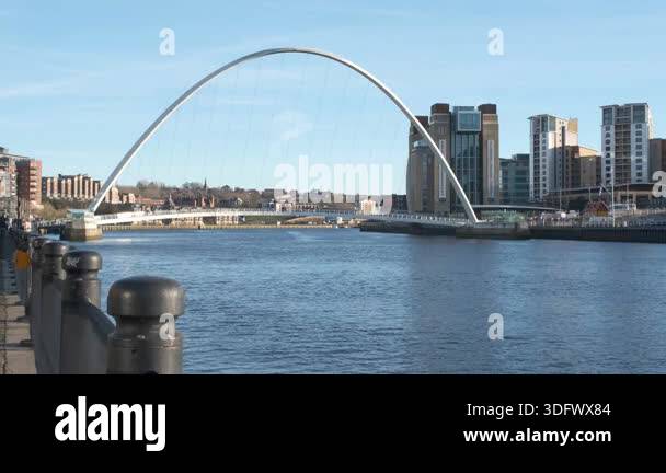 Gateshead Millennium Bridge spans the River Tyne between Newcastle and ...