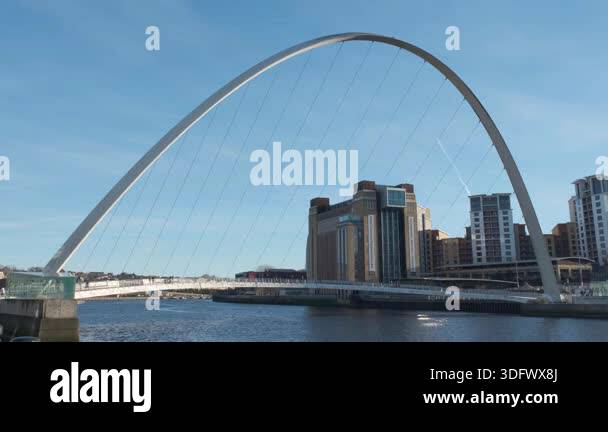 Gateshead Millennium Bridge spans the River Tyne between Newcastle and ...