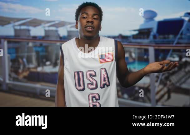 Young african american man with outstretched hand and shrug gesture on ...