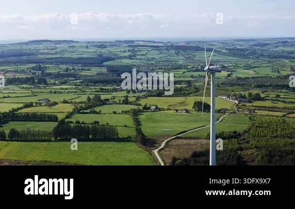 West Cork, Ireland, May 5, 2025. Wind turbine on a green Irish ...
