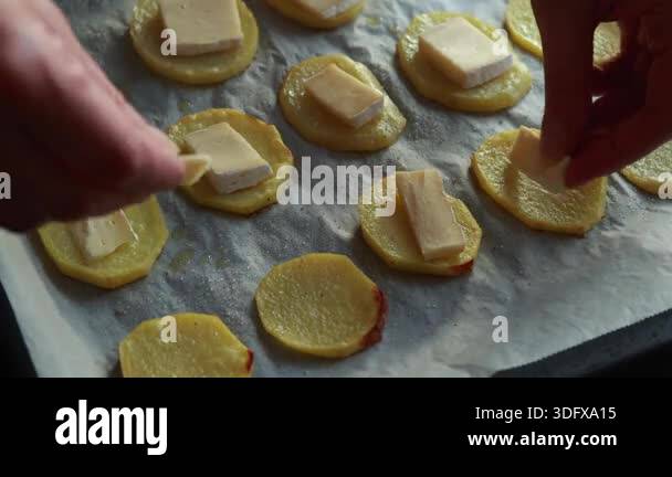 Potato Slices Topped with Brie Cheese in Tray Party Appetizer Stock ...