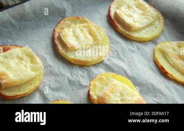 Potato Slices Topped with Brie Cheese in Tray Party Appetizer Stock ...