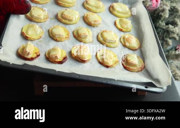 Potato Slices Topped with Brie Cheese in Tray Party Appetizer Stock ...