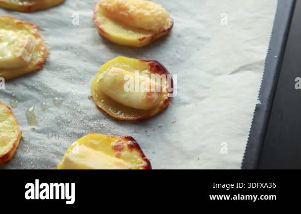 Potato Slices Topped with Brie Cheese in Tray Party Appetizer Stock ...