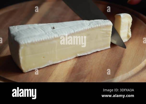 Woman Slicing Brie Cheese on Wooden Cutting Board Gourmet Appetizer ...