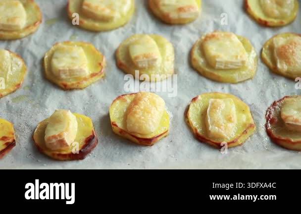 Potato Slices Topped with Brie Cheese in Tray Party Appetizer Stock ...