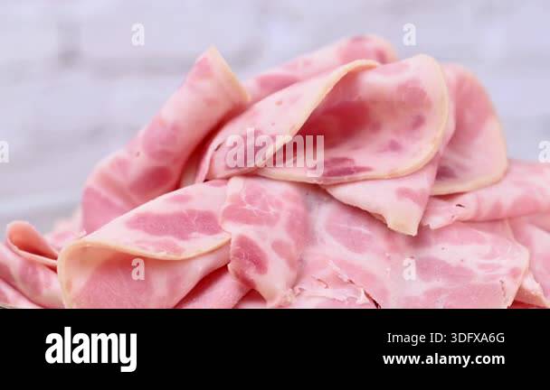 A close-up video of sliced ham Stock Video Footage - Alamy