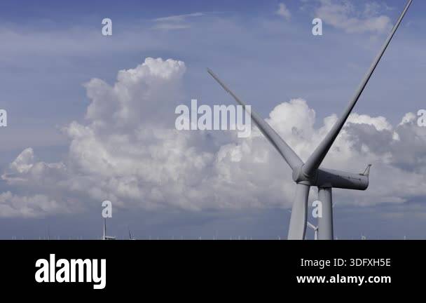 Closeup beautiful solo wind turbine at green mountain hill clean ...
