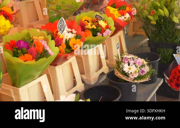 Beautiful bouquets of mixed fresh flowers at a local French market ...
