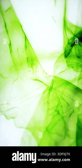 Abstract shapes in motion. Translucent green forms swirl against a ...