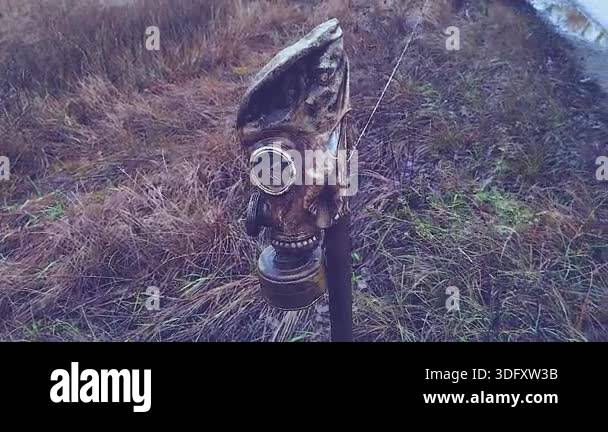 Close-up of a gas mask in the forest. Equipment for protection against ...