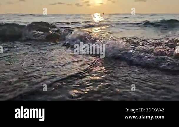 Close up view of the calm sea water surface with soft waves rolling ...