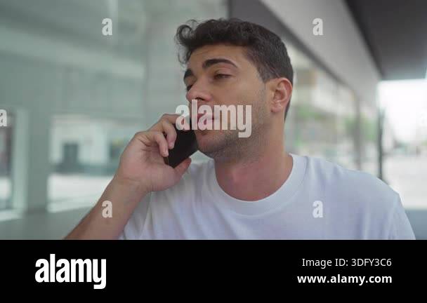 Man holds phone holding steady outdoors while young group and hispanic ...