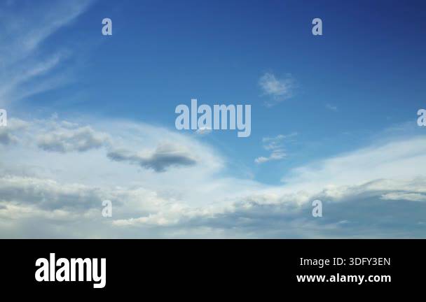 Clouds running on blue sky, timelapse Stock Video Footage - Alamy