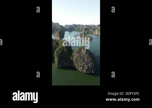 Rocky islands surrounded by calm blue water Stock Video Footage - Alamy