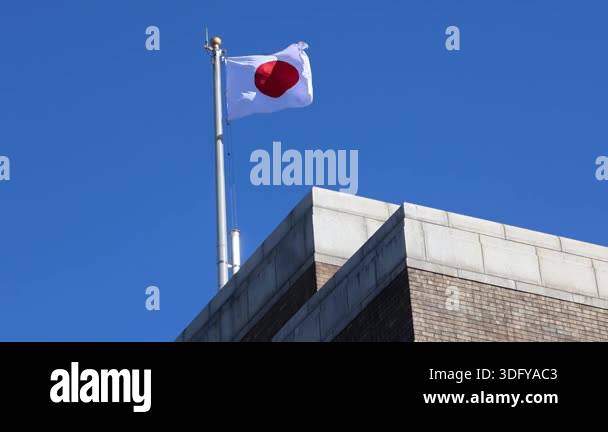 Japan flag with blue sky. Japanese flag Stock Video Footage - Alamy