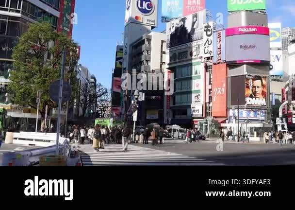 Tokyo, Japan- 16 Dec 2025: People crossing the iconic Shibuya Scramble ...