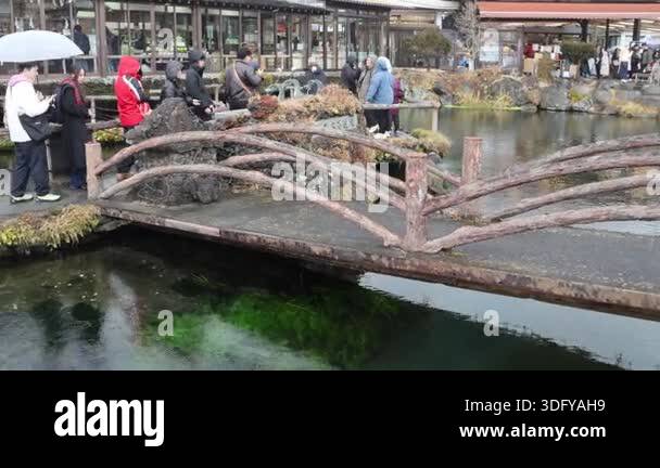 Oshino, Japan- 20 Dec 2025: Nakaike Pond of Oshino Hakkai, Japan. It is ...