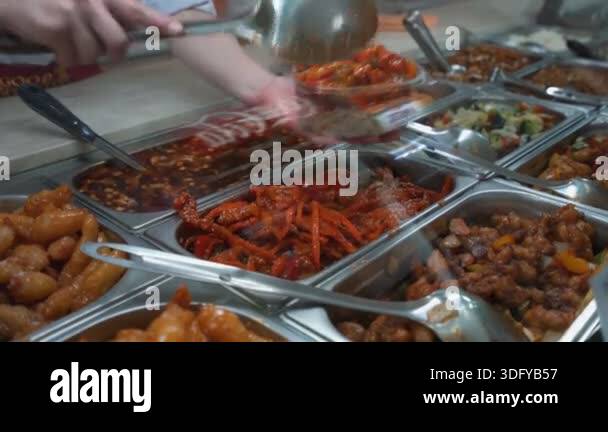 Woman imposing japanese food into a box Stock Video Footage - Alamy