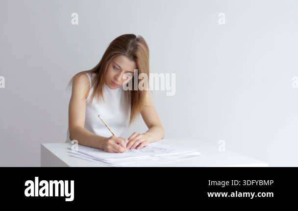 Architect Woman drawing construction project Stock Video Footage - Alamy