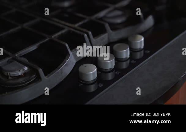 hand placing espresso maker on stove Stock Video Footage - Alamy