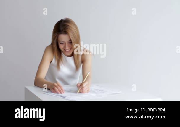 Funny Architect Woman drawing construction project Stock Video Footage ...
