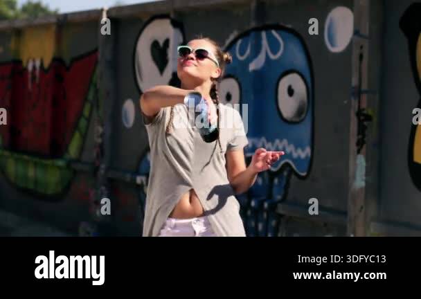 young woman in sunglasses shaking spray paint Stock Video Footage - Alamy