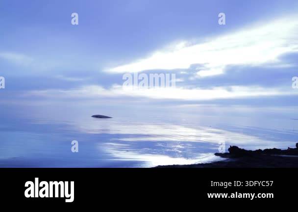 Amazing blue sunset form beach Stock Video Footage - Alamy