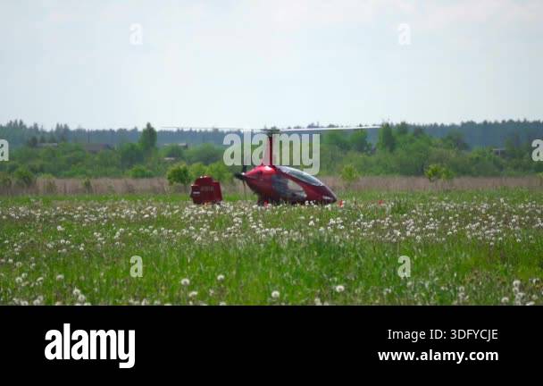 Red Helicopter is preparing to hop off Stock Video Footage - Alamy