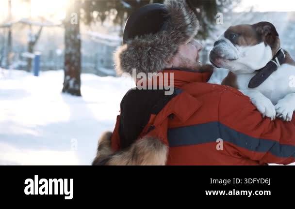Man hugging his dog Stock Video Footage - Alamy