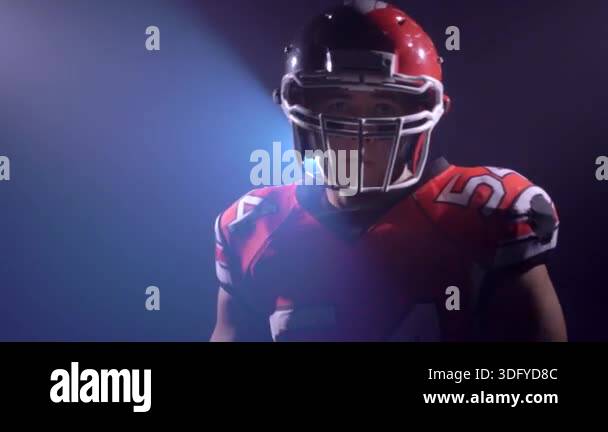 Agressive American football player looking to camera Stock Video ...