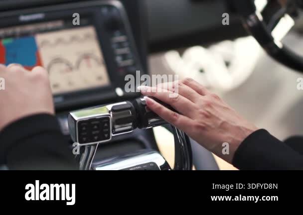 female hands on a wheel of a motor boat, yacht Stock Video Footage - Alamy