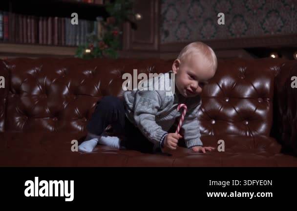 A child eating candy at xams library Stock Video Footage - Alamy