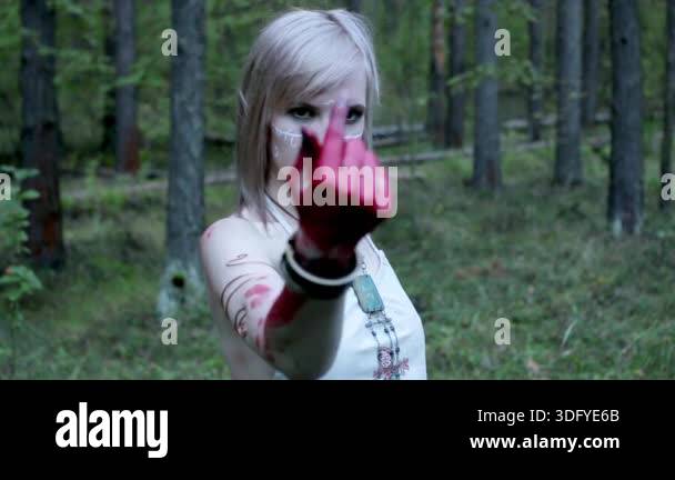 Native American woman waving bloody hand Stock Video Footage - Alamy