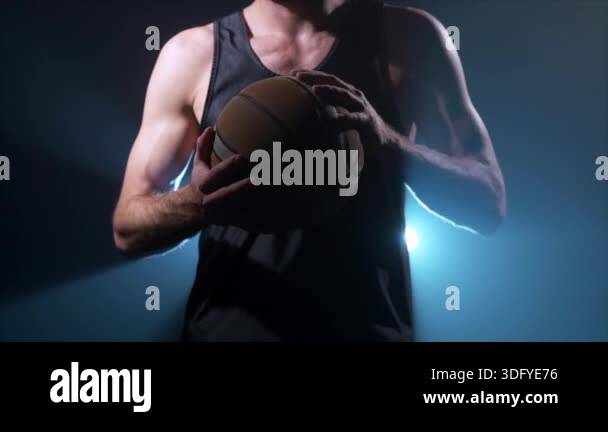 Headless basketball player holding a ball Stock Video Footage - Alamy