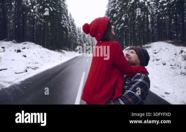 Happy winter couple in the winter forest Stock Video Footage - Alamy