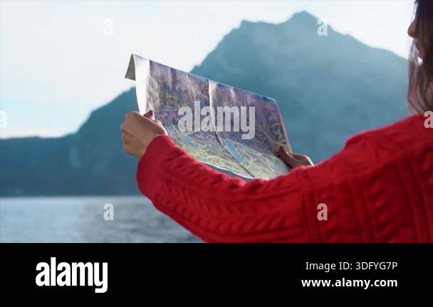 A girl with a map of mountains Stock Video Footage - Alamy