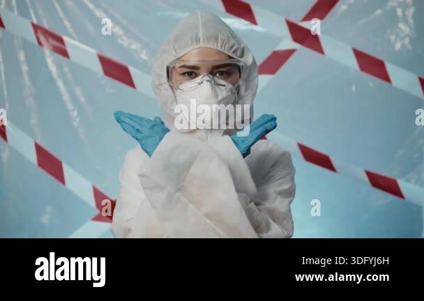 Medical lab female doctor in mask with protective infection gloves and ...