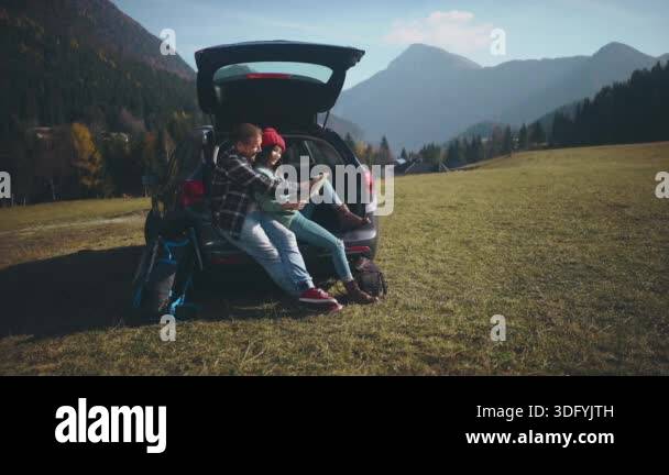Pretty lovers exploring the local nature. Cute hipster couple of young ...