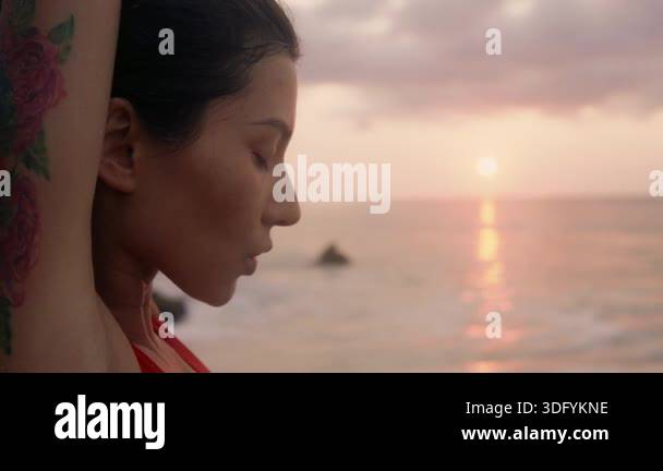 Asian girl doing breathing exercises. Portrait woman face relaxing ...