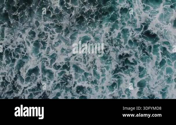 Top down view of fantastic tropical sea tide on coastline. Drone shot ...