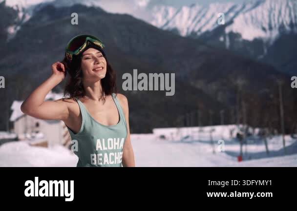 Cute girl smiling at background of mountain Stock Video Footage - Alamy