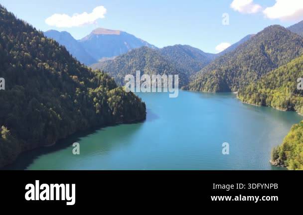 Background and copy spase concept. Fly high above water surface ...